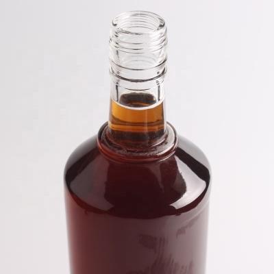 Cina 2022 Bottiglia di vetro a fondo spessa in rilievo, pietra cristallina chiara per gin, whisky, rum, tequila, brandy in vendita