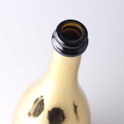 Cina Bottiglie di vetro di champagne d'oro personalizzate con tappo di plastica per materiali di corpo in vetro in vendita
