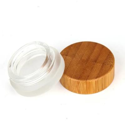 China Eco Friendly Mini Empty 5ml 7ml Glass Eye Cream Cosmetic Concentrate Containers Jars With Bamboo Wood Lid for sale