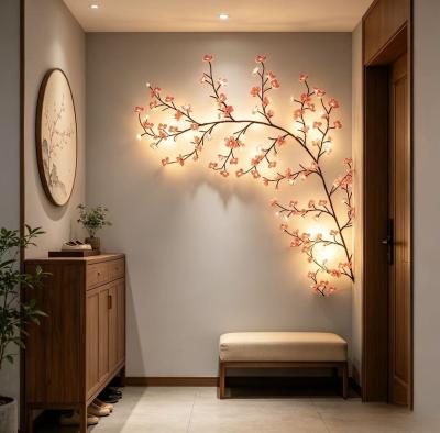 China This wall-mounted lamp features naturally curved branches adorned with red plum blossoms in a gradient hue; it effortlessly creates a soothing home atmosphere without the need for complex renovations. for sale