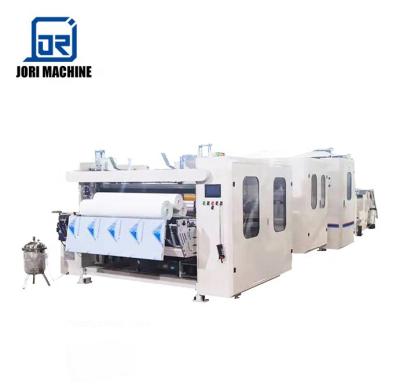 China Full Auto Buffer Device Continuously Glued Embossing Laminated Paper Towel Making Machine for sale