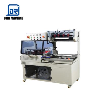China PE shrinking Maxi roll paper towel making and packing  machine for sale
