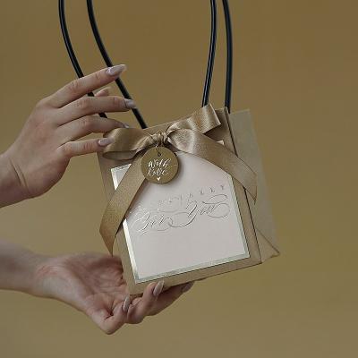 China Custom Logo Print Wholesale Grocery White Brown Kraft Paper Gift Bag Cute Craft Paper Bag With Handle for sale