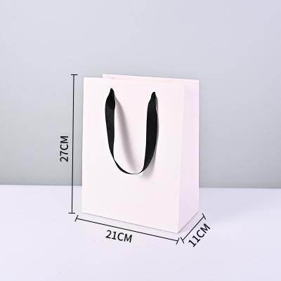 China Custom Printed Paper Bags Customized Custom Order CMYK Surface Printing Customized for Your Business Development for sale