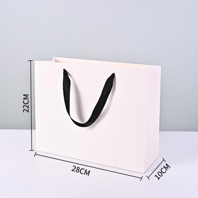 China Custom Printed Paper Bags Customized Custom Order CMYK Surface Printing Customized for Your Business Development for sale