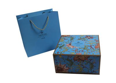 中国 ハンドルのハンドメイド200gsmペーパー材料が付いているCMYKのロゴの青い紙袋 販売のため