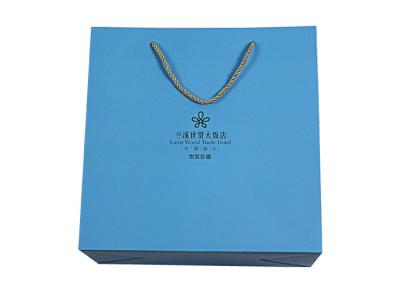 中国 ハンドルのハンドメイド200gsmペーパー材料が付いているCMYKのロゴの青い紙袋 販売のため