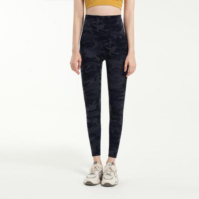 中国 ナイロン女性は堅くズボンのEcoの灰色のカーモのヨガのズボンのActivewearをごまかす 販売のため