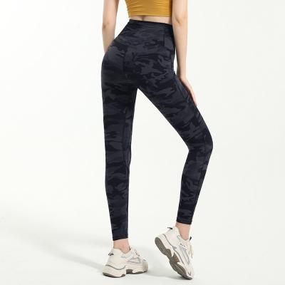 中国 ナイロン女性は堅くズボンのEcoの灰色のカーモのヨガのズボンのActivewearをごまかす 販売のため