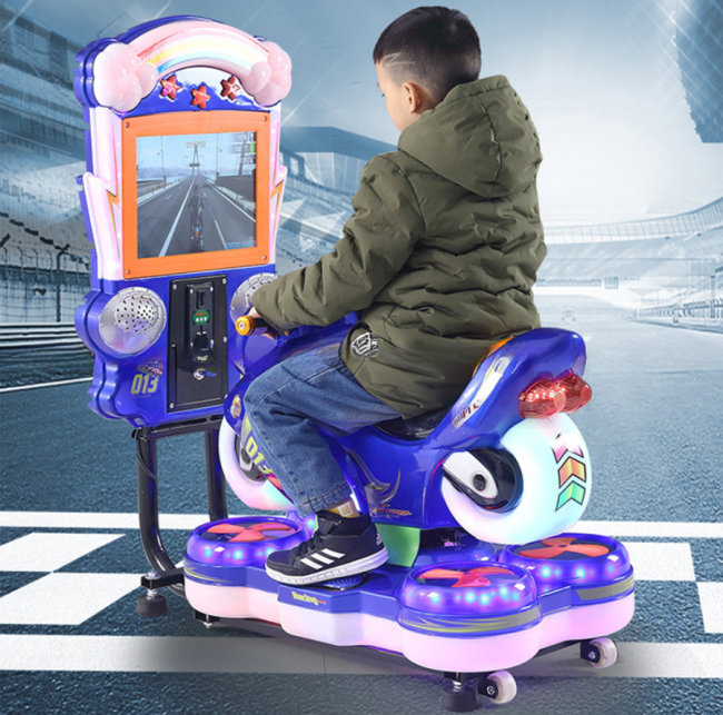 Children enjoying the motorcycle ride in game center