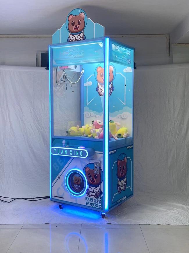 Dreamland Claw Crane Machine front view with colorful lighting