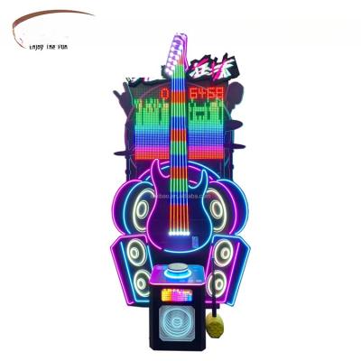 China Entertainment Attractive Design Crazy Guitar Game Machine Coin Operated for sale