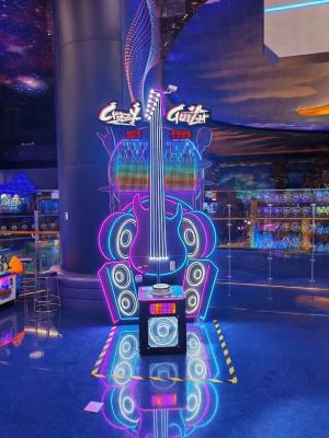 China Entertainment Attractive Design Crazy Guitar Game Machine Coin Operated for sale