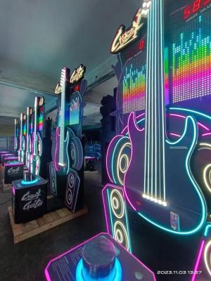 China Entertainment Attractive Design Crazy Guitar Game Machine Coin Operated for sale