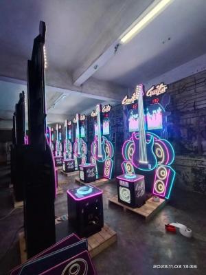 China Entertainment Attractive Design Crazy Guitar Game Machine Coin Operated for sale