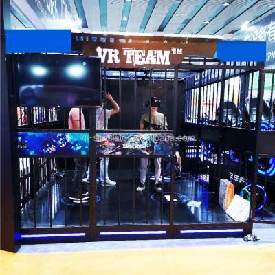 China Dreamland 9d simulator shooting game machine 4 players vr room vr arcade zombie shooting game machine for sale
