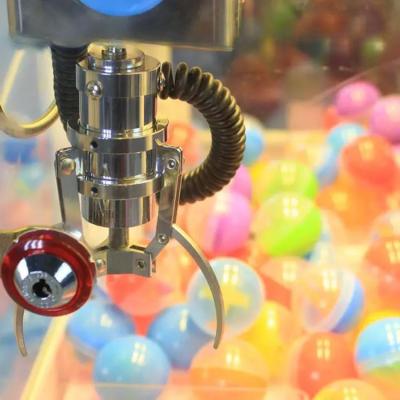 Quality Dreamland Coin Operated Mini Super Plush Doll Claw machine for bar for game for sale