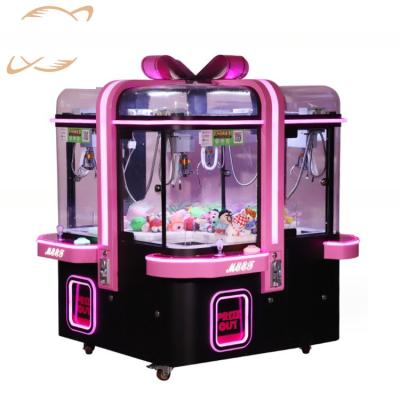 China Dreamland Gift Store Electronic Arcade Four Players Claw Machine Boutique Toy Vending Claw Crane Machine for sale