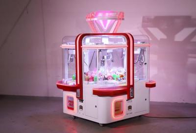 China Dreamland 4 players catch boutique grab gift mini plush toy claw crane machine coin operated claw game machine for sale