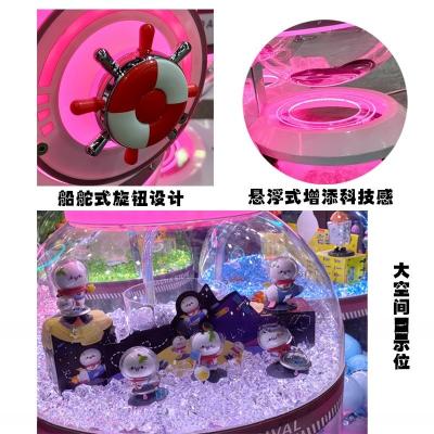 China Dreamland mayorista de monedas eléctricas operado gacha premio máquina de juego máquina expendedora de juguetes cápsula para el centro comercial en venta
