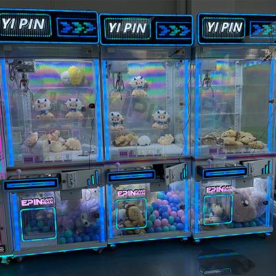 China Dreamland Coin Operated Colorful Led Lights Crane  Transparent Glass Display Claw Machine Claw Prize Game Machine for sale