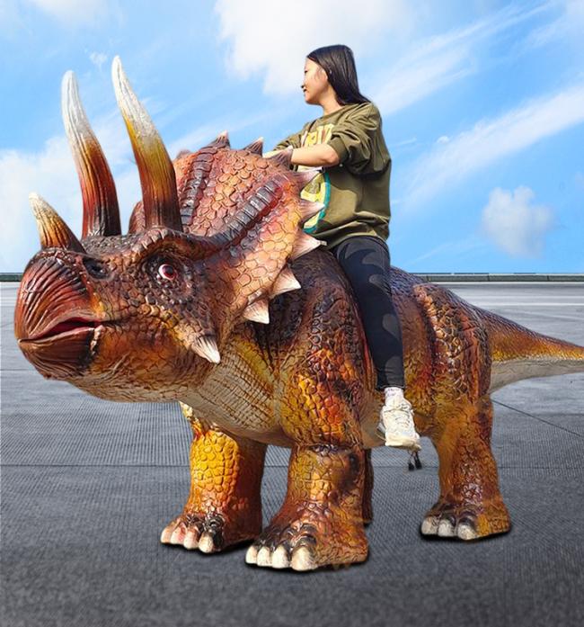 Detailed close-up of animatronic dinosaur head showing realistic features