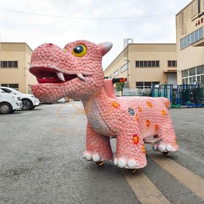 China Pink Color Life Size Realistic Animatronic Dinosaur Ride , Kids Ride On Electric Dinosaur for sale