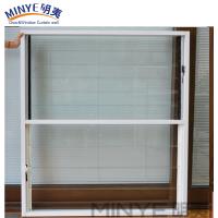China Low-E Glass Electric Exterior Rolling Shutter Window 5mm+12A+5mm Horizontal Opening Pattern for sale