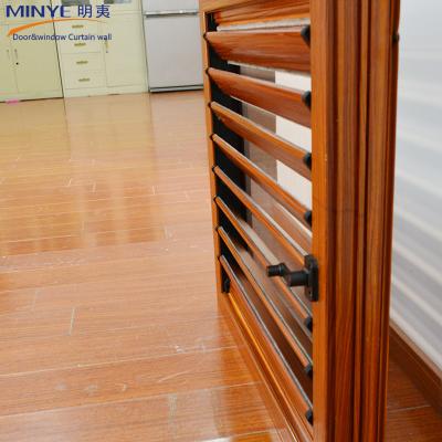 中国 木材の色プロファイルのためのアルミ合金で堅固で耐久性のある調整可能なシャッター 販売のため