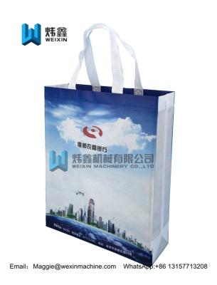 China Custom Wholesale Hot Sale Reusable non woven gift bag with logo /white handle2.5*40cm for sale