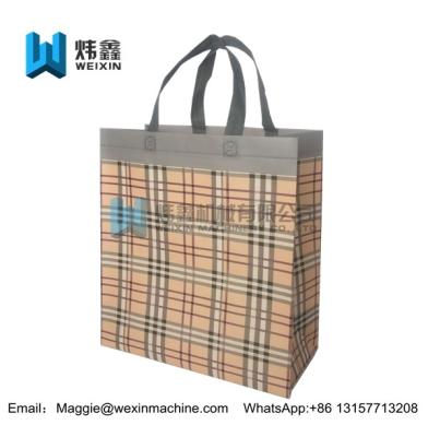 China Custom Printed Logo Gift Non Woven Bag Shopping Handle Non-woven Cloth Bag For Garment for sale