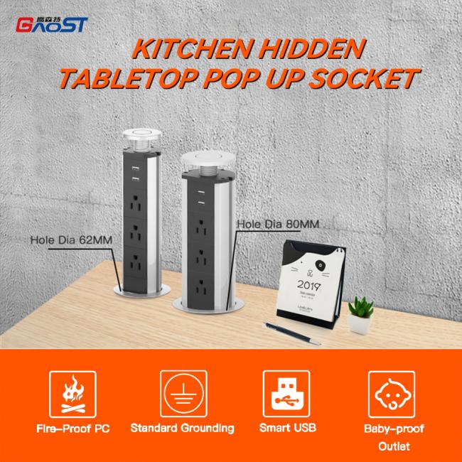 Close-up view of pop-up power socket tower interface and construction