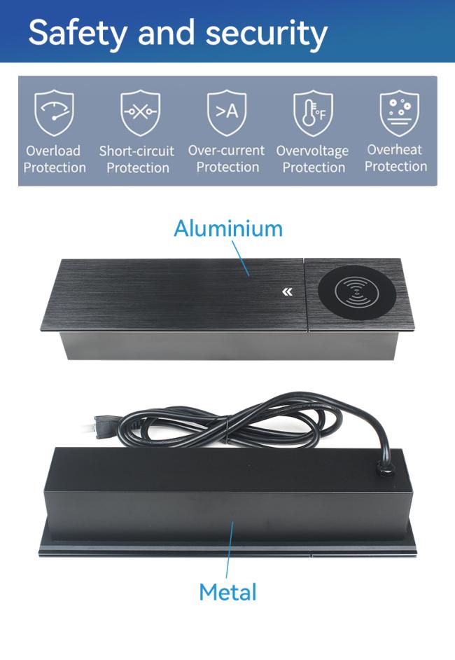 Close-up view of hidden desk outlet with USB ports and wireless charging surface