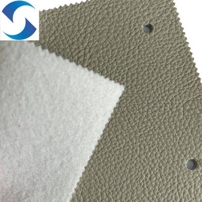 China 55/62 Width Faux Leather Fabric with Embossed Pattern available for sale