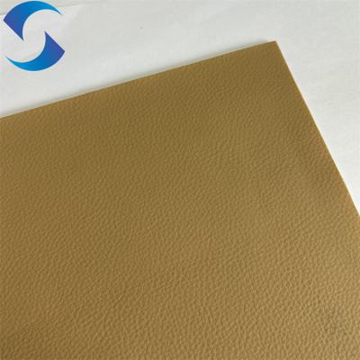 China Woven Backing Faux Leather Fabric For Upholstery With 100% Polyester Non Woven Sofa Fabric for sale