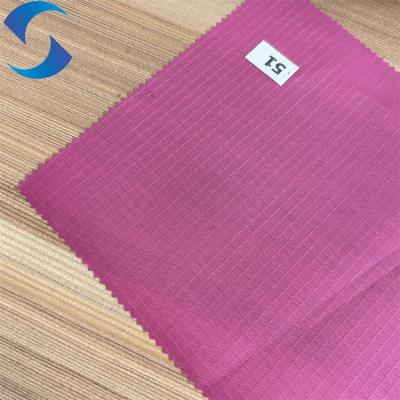 China 190T Taffeta Fabric 0.3CM Ripstop Soft And Resilient Polyester for sale