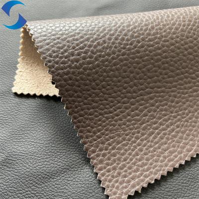 Cina Colore marrone Eco-friendly Imitazione di cuoio Flocked Backing Technic tessuto di cuoio sintetico per l'automobile in vendita