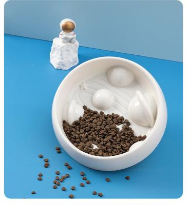 China Pet Planet Shaped PP Slow Food Bowl Non Slip and Non Knockover Dog Bowl for sale