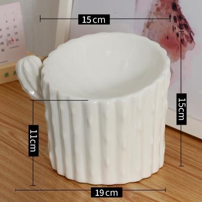 Cina Ciotola bevente dell'animale domestico di Cat Food Bowl From Spilling del cane del cactus delle vertebre cervicali di Cat Bowl Porcelain To Protect in vendita