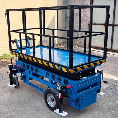 China Factory Supply Mini Manual Battery Power Electric Push Around Scissor Lift Type Pulling Aerial Work Platform for Home Used for sale