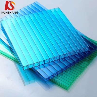 China Chapas exteriores lisas Kunshang Painel de sol de plástico PC Folha de mel Polycarbonate Folha de telhado oco para estufas à venda