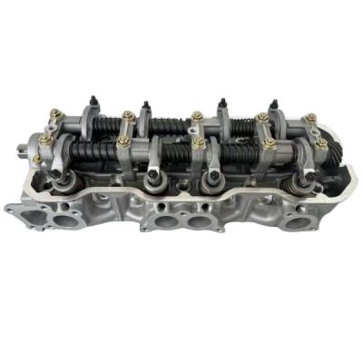 China 4ZD1 Engine Complete Cylinder Head for Isuzu 2.3L  HEART-SHAPED CHAMBER for sale