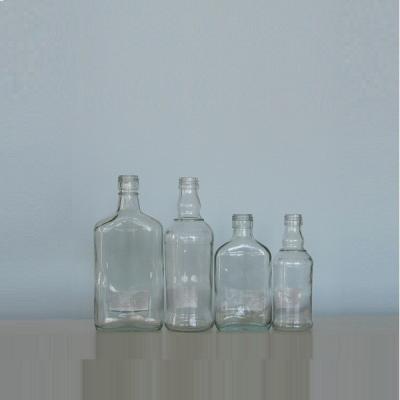 China 250ml flint and transparent  small  liquor glass bottle for sale
