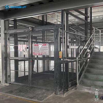 China 3000kg Q235 Steel Vertical Hydraulic Cargo Lift Freight Platform Transportation System for sale