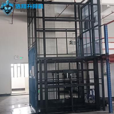 China Indoor Hydraulic Mezz Lift Single Pallet Mezzanine Floor Lift Industrial Grade Steel for sale