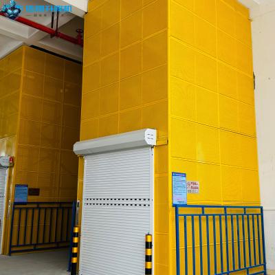 China Customized Commercial Hydraulic Cargo Lift Two Floors Rolling Shutter Door 3 Ton for sale