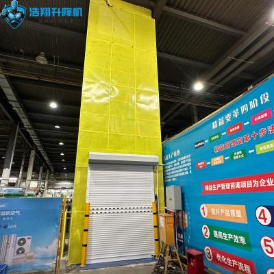 China Yellow Profrated Metal Industrial Cargo Lift System Hydraulic Lift For Warehouse 4T 12M for sale