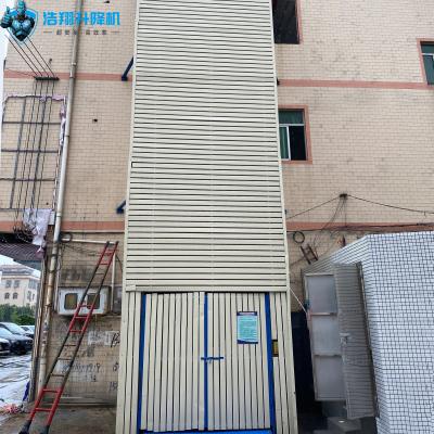China 380V Vertical Mezzanine Floor Lift 500kg-50T Load Goods 5M-50M Stroke Manual Auto for sale