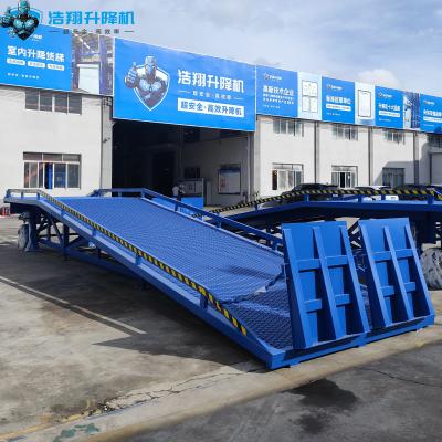 中国 調節可能な移動コンテナ 荷重ロードランプ 10-20t コンテナの荷重と卸荷のための水力式リフトテーブル 販売のため