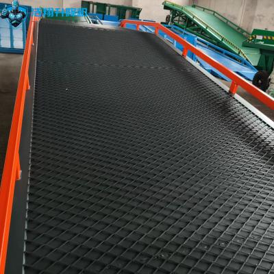 Cina Rampa mobile portatile per magazzino con scarico antiscivolo idraulico regolabile per carico container in vendita